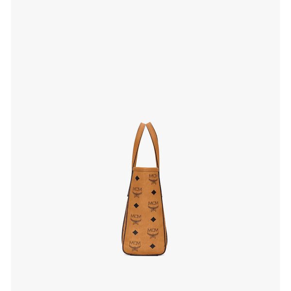 MCM A compact shopper with unmatched versatility, accompanied by a lea ...