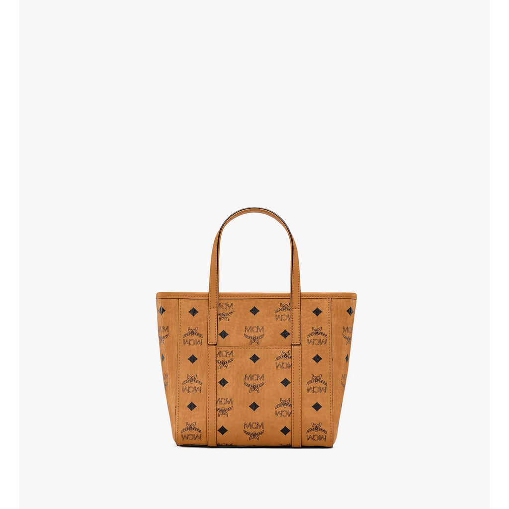 MCM A compact shopper with unmatched versatility, accompanied by a lea ...