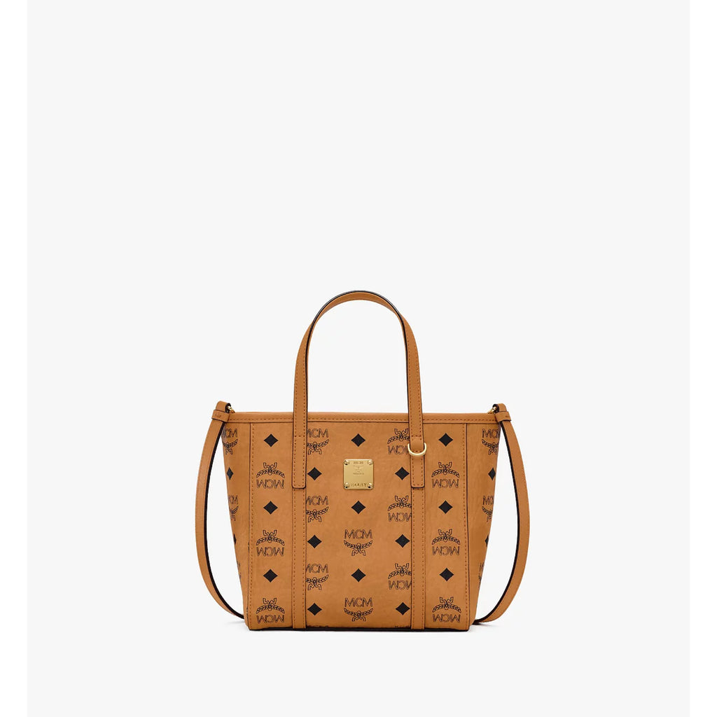 MCM A compact shopper with unmatched versatility, accompanied by a lea ...